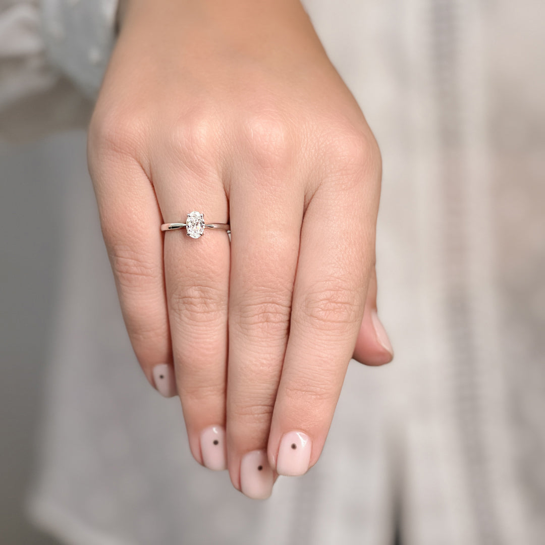 0.8 carat oval diamond ring store